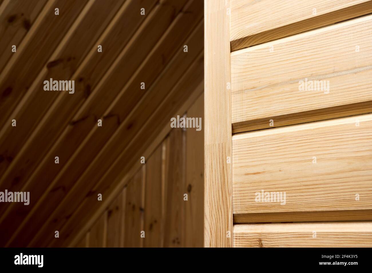 Interior carpentry background. Softwood clapboard, batten, plank timber ...