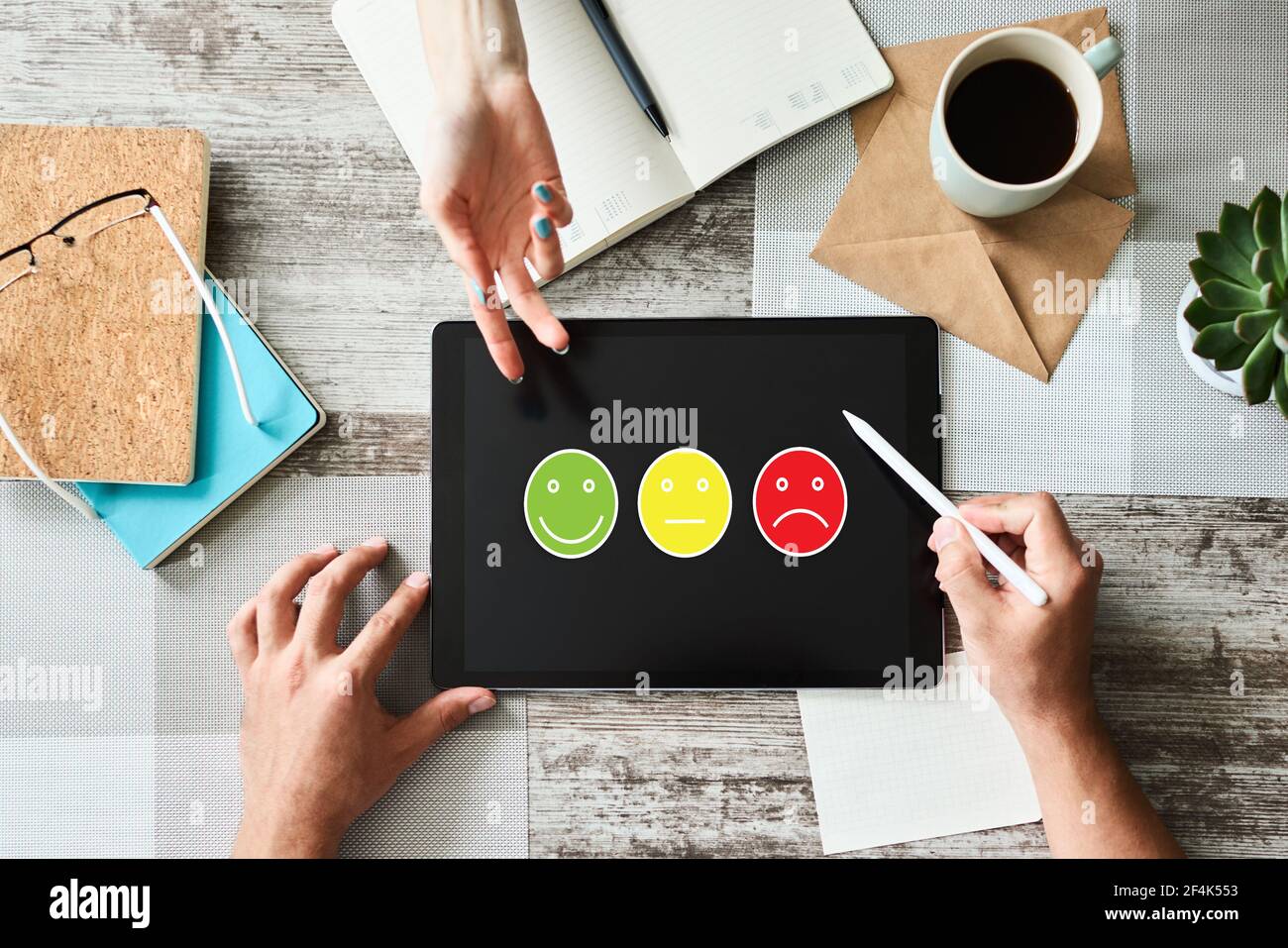 Colored smiles. Customer satisfaction control on device screen. Service ...