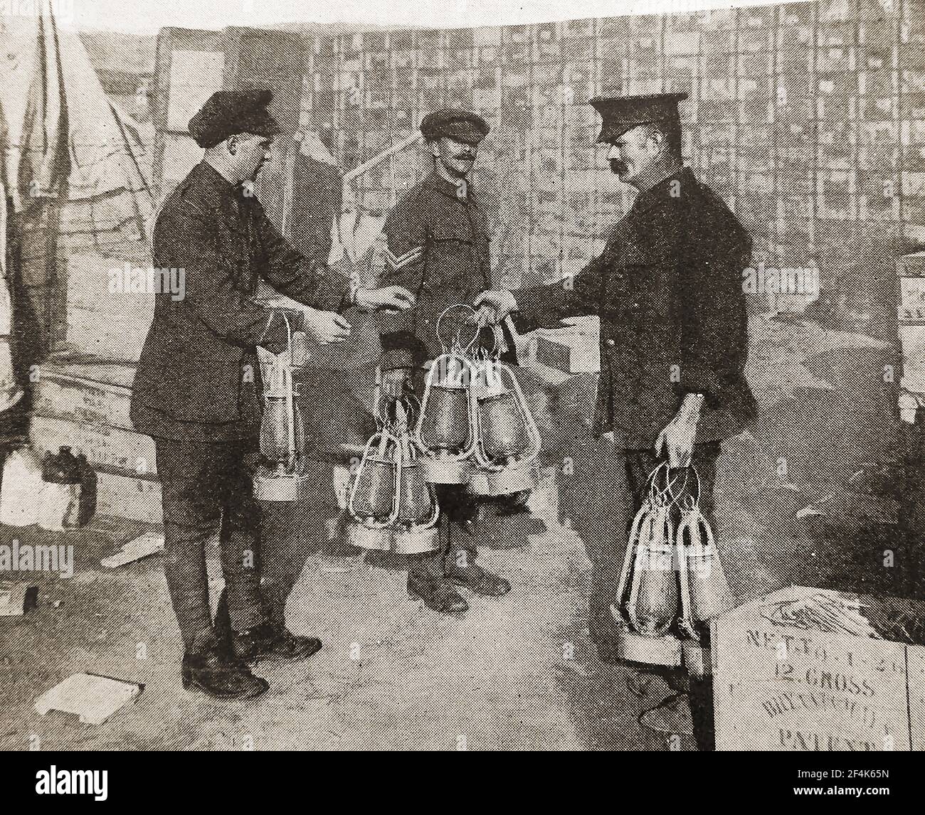 WWI Lieutenant Cassidy collects lanterns used during in the Suvia bay ...