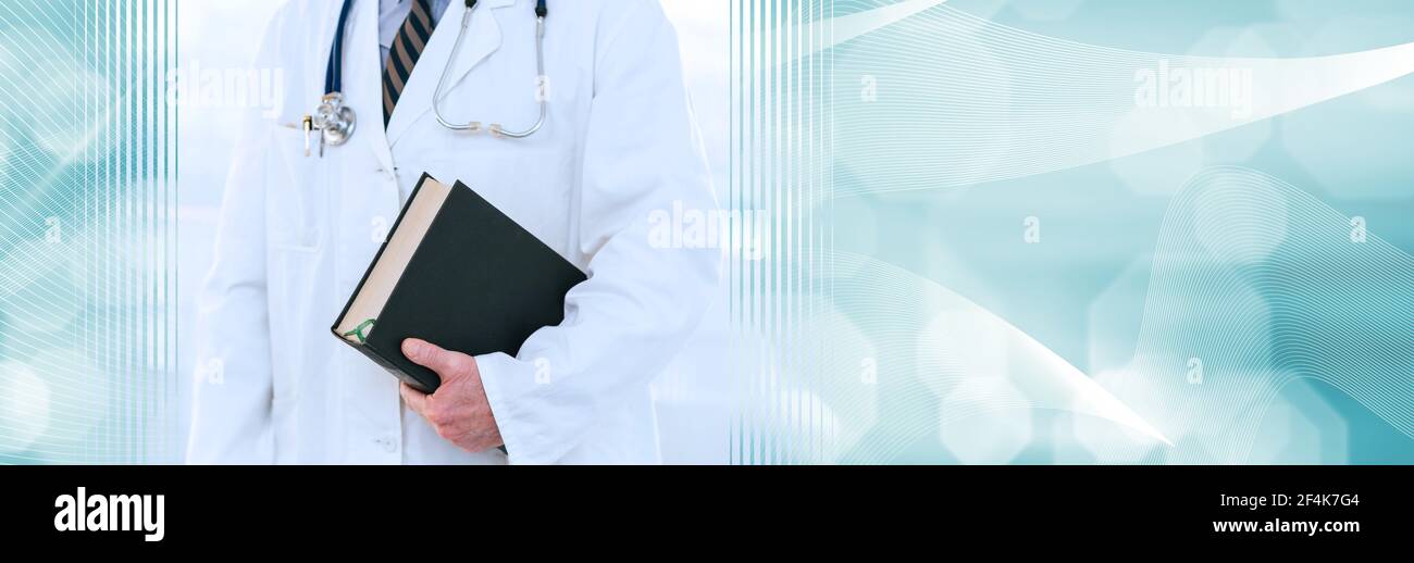 Doctor standing and holding a medical textbook; panoramic banner Stock ...