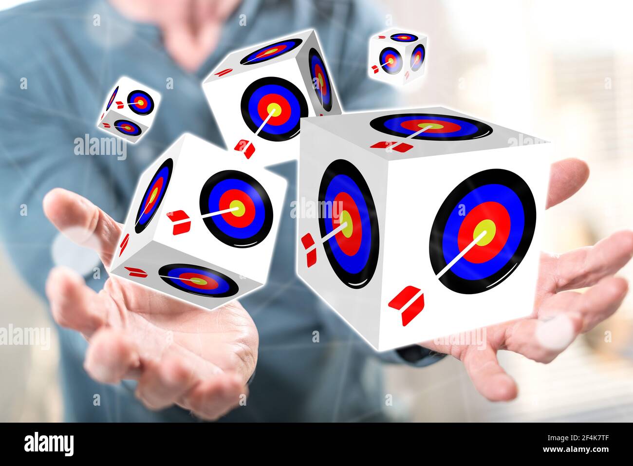 Target marketing concept above the hands of a man in background Stock ...