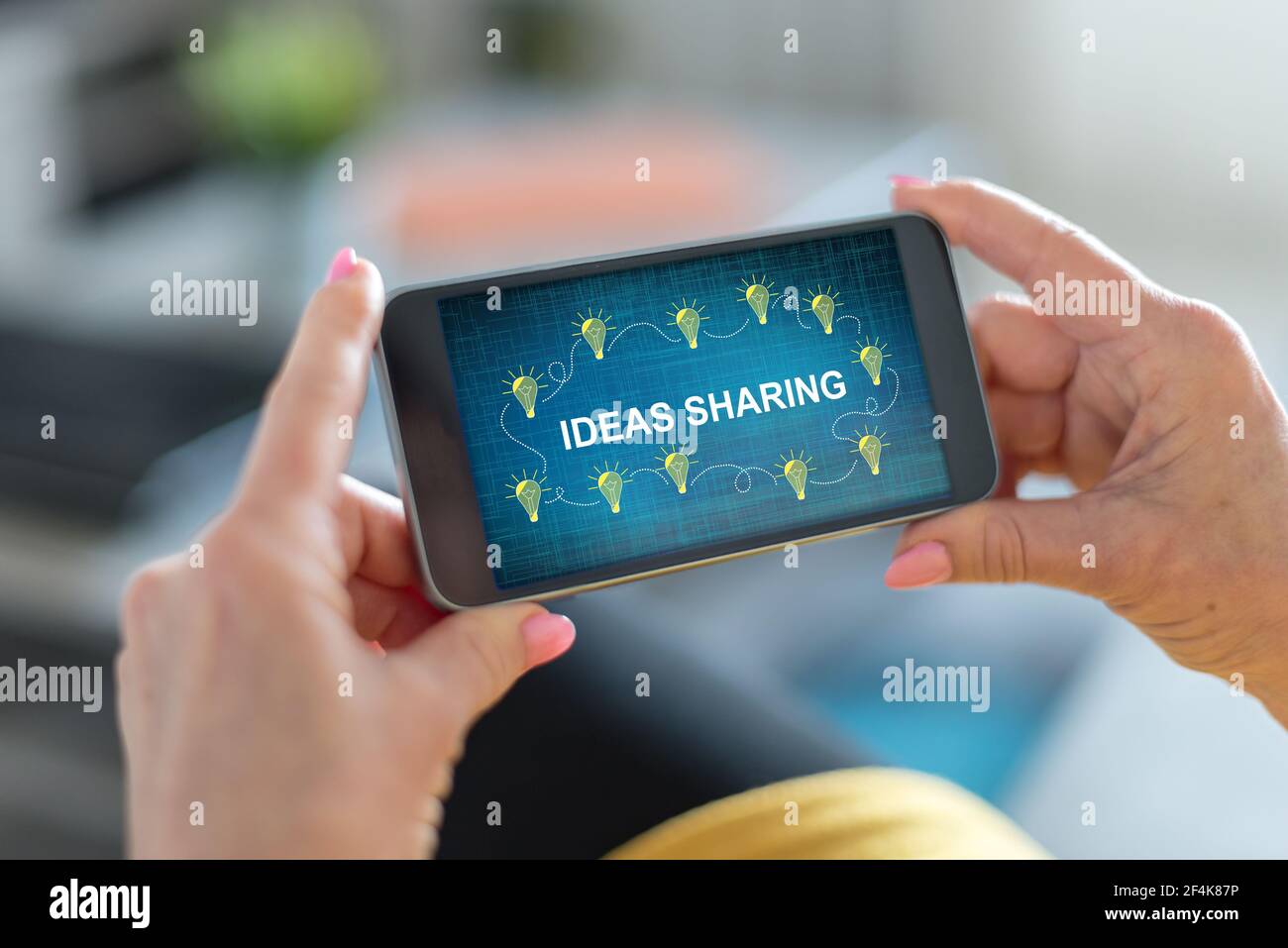 Smartphone screen displaying an ideas sharing concept Stock Photo - Alamy