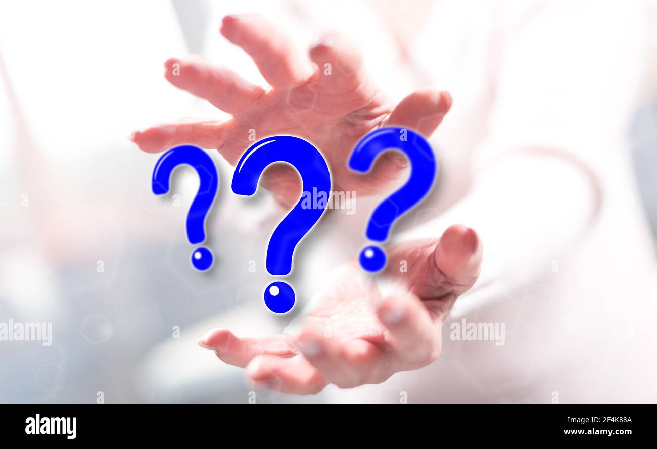 Question concept between hands hi-res stock photography and images - Alamy