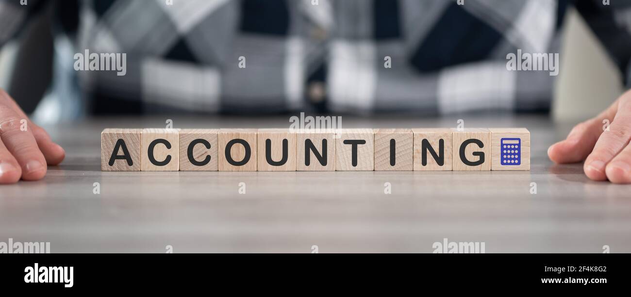 Concept of accounting on wooden cubes Stock Photo - Alamy
