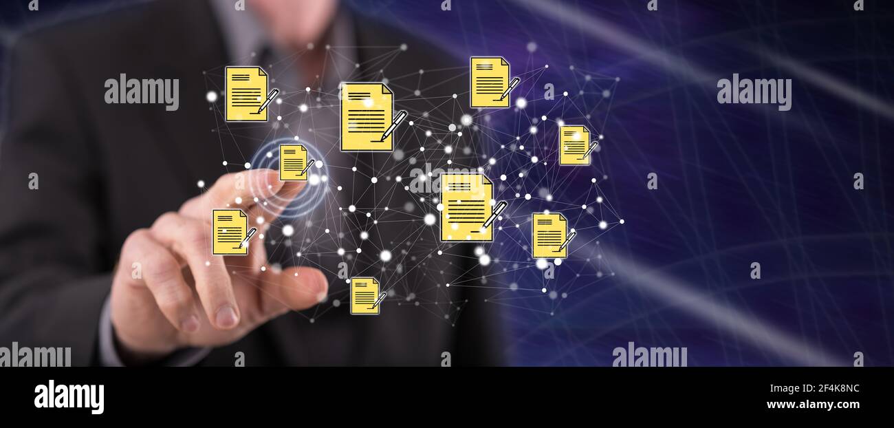Man touching a compliance concept on a touch screen with his finger ...