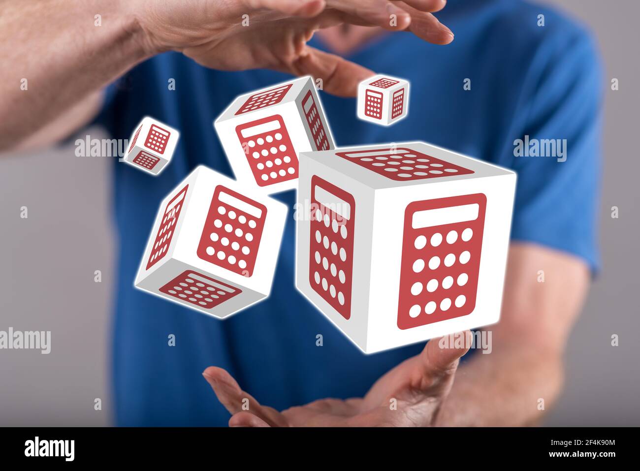 Accounting concept between hands of a man in background Stock Photo - Alamy