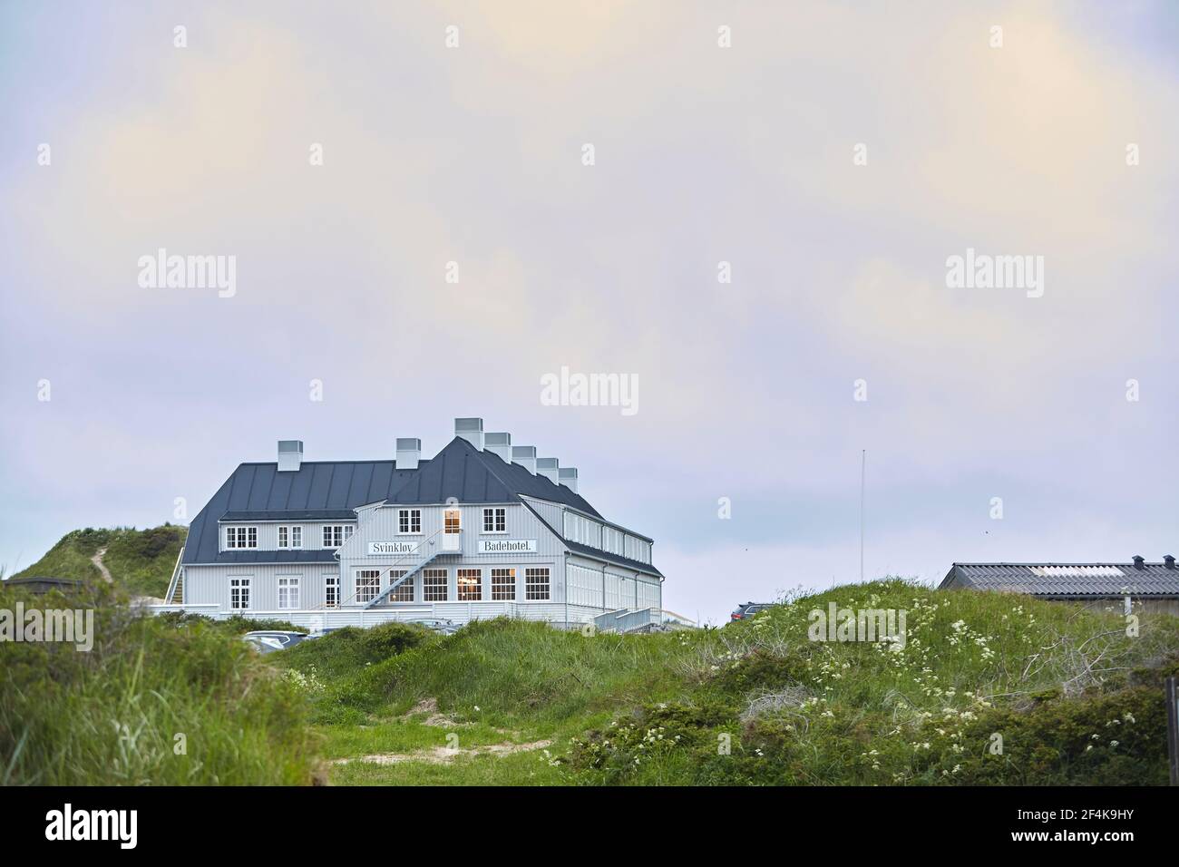 a beautiful restaurant by the water and beach Stock Photo - Alamy