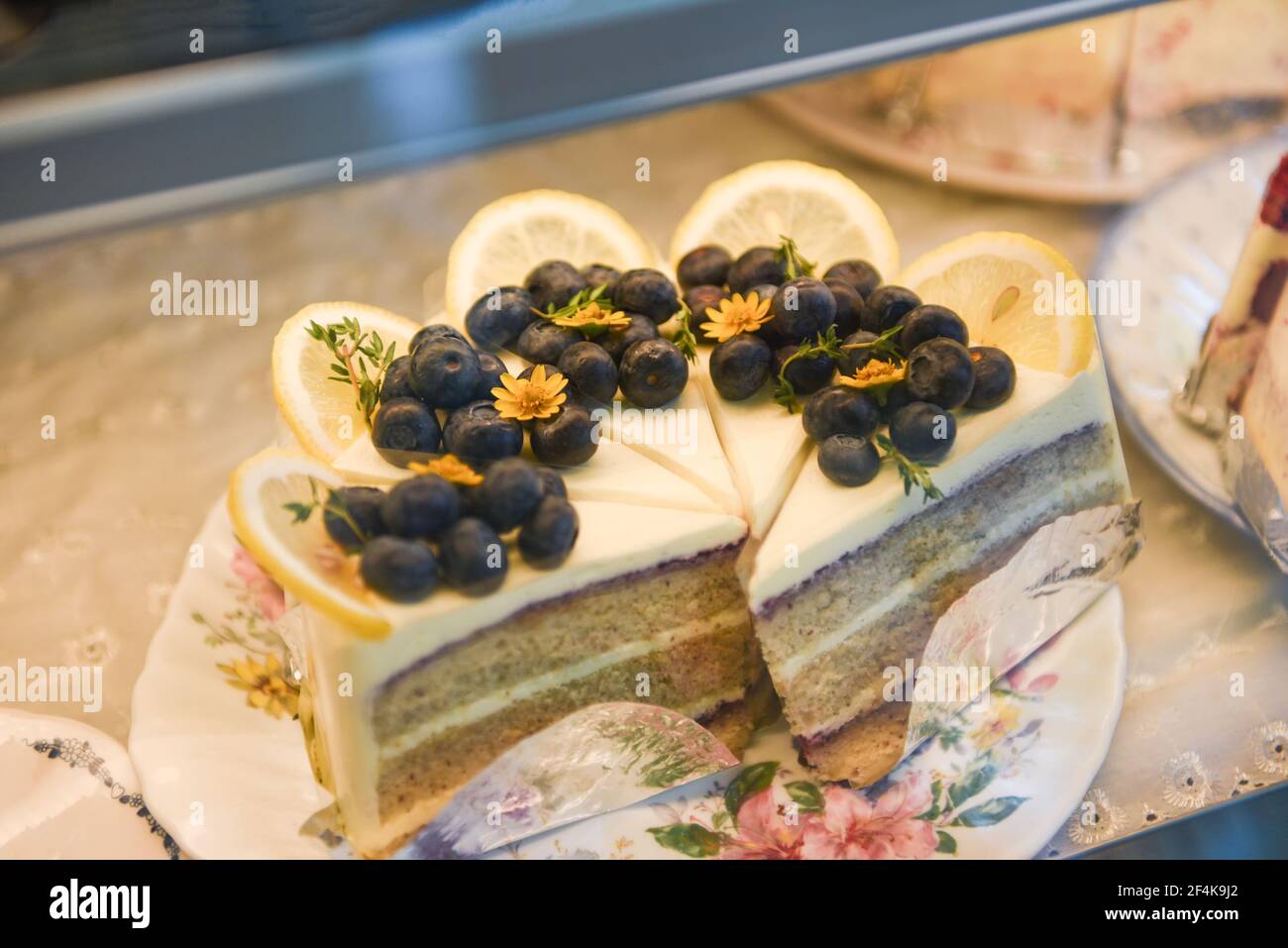 Cake on shelf with cake blueberry and lemon on store bakery shop Stock ...