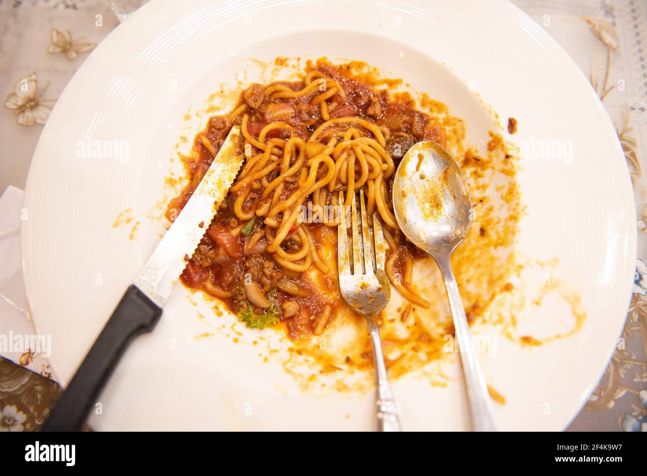 food waste plate with spaghetti - Plate after eating food, dirty dishes ...