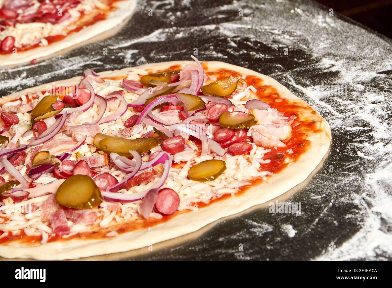 Pizza before oven hi-res stock photography and images - Alamy