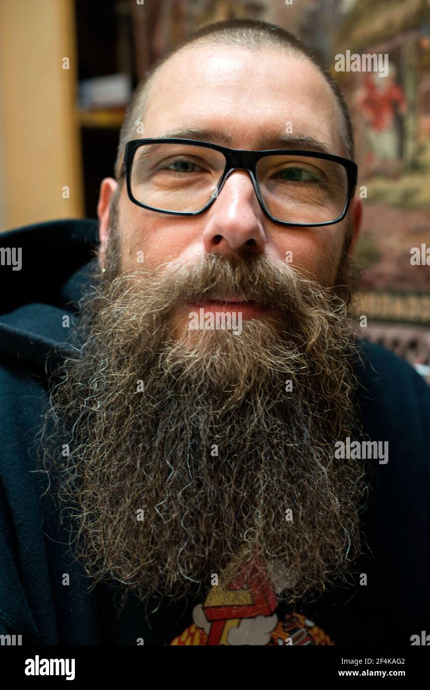Rotterdam, Netherlands. Portrait man with glasses, moustache and beard ...