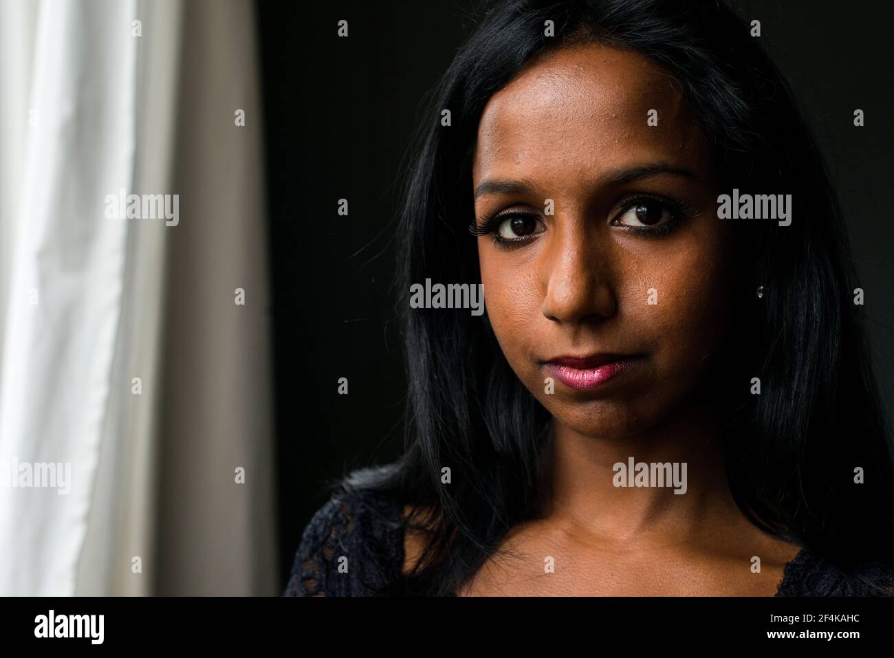 Tilburg, Netherlands. Studio Portrait of a young, coloured woman born ...