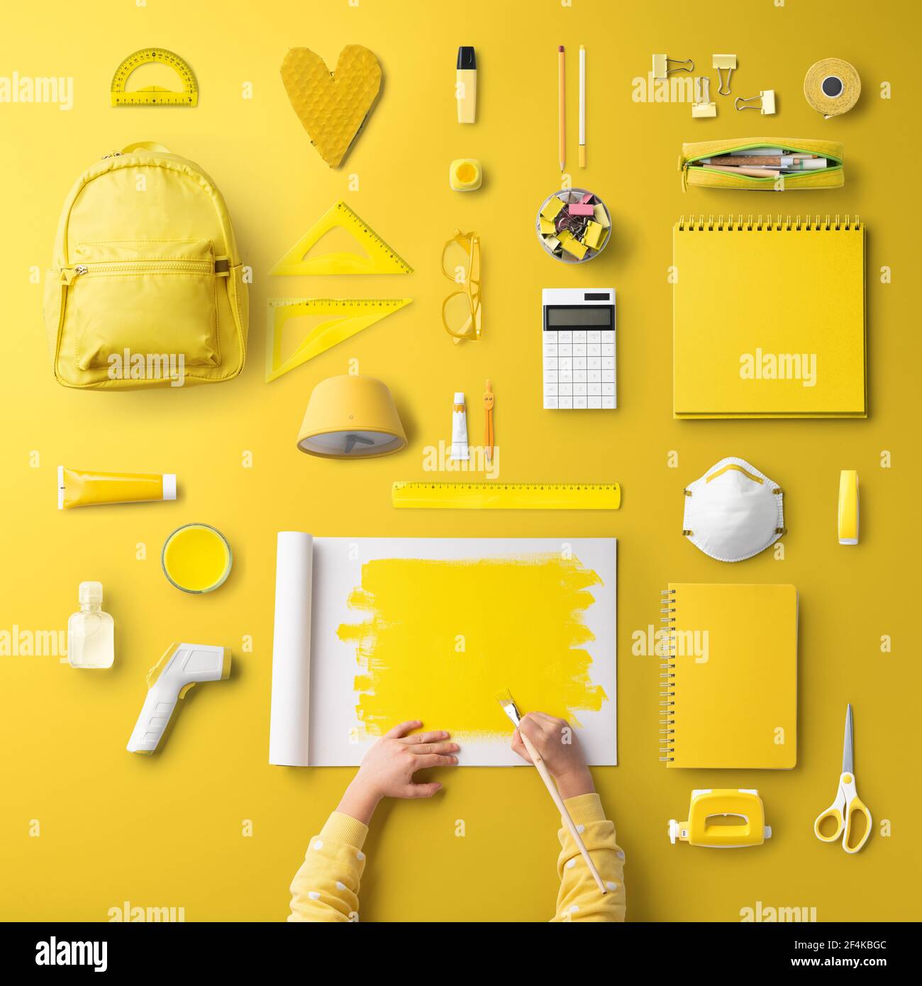 Flat lay top view of respirator and school supplies, back to school and ...