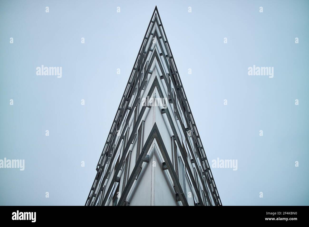 a triangle building with a clear sky Stock Photo - Alamy