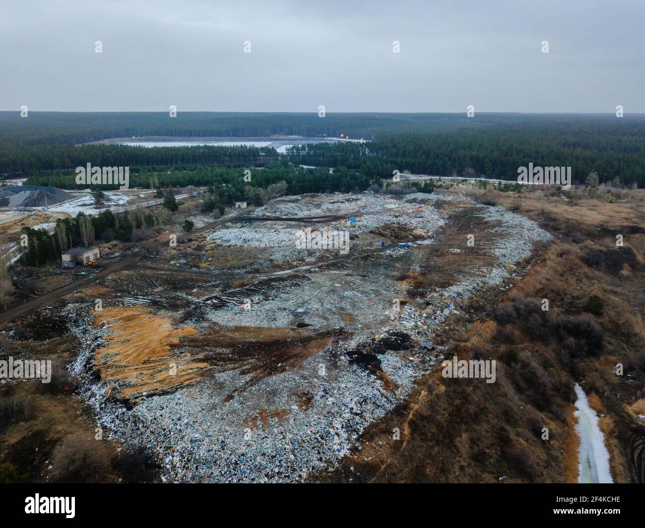 Aerial top view photo of large garbage pile at solid waste landfill ...