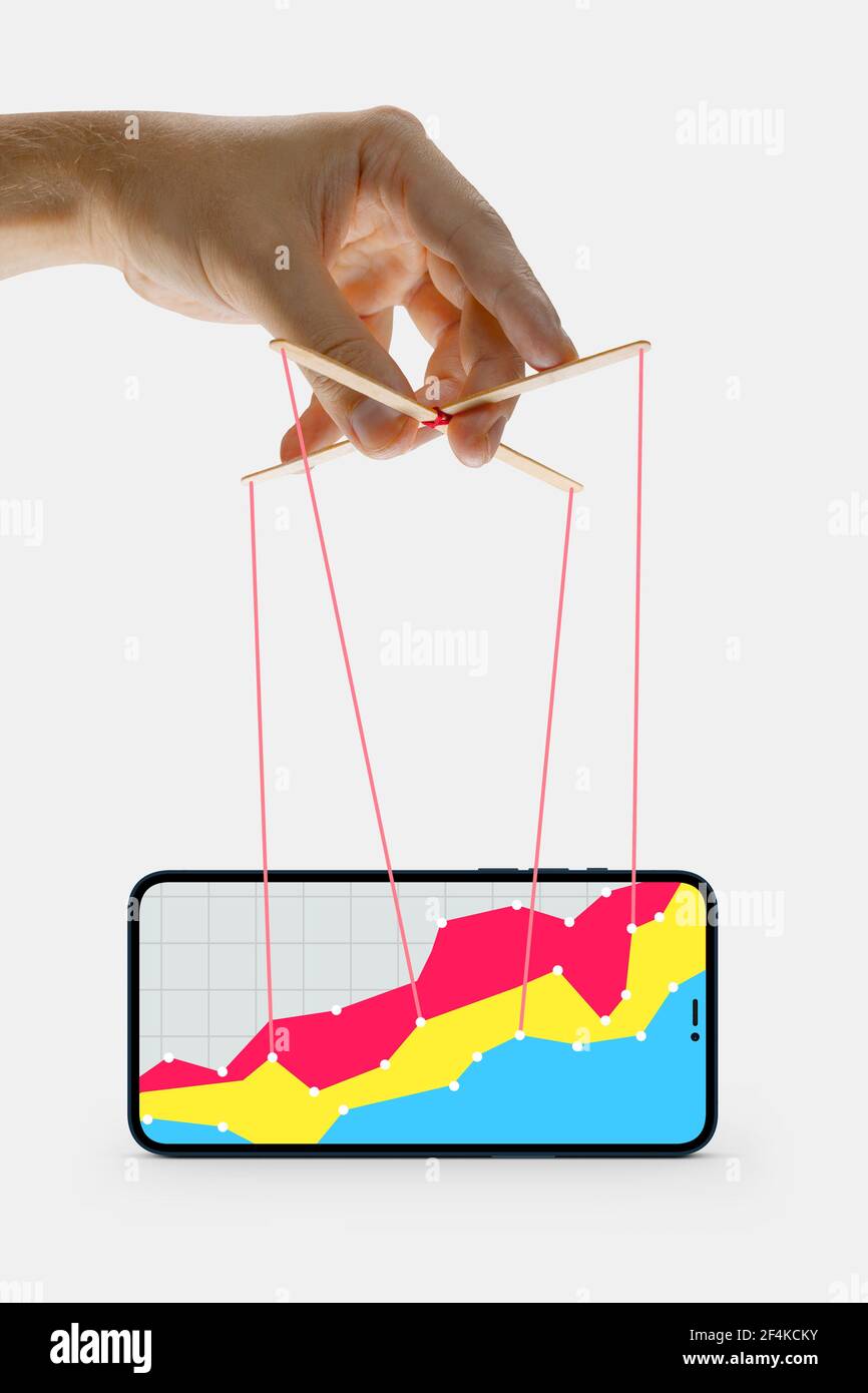 Businessman keeping the growth in economy, manipulating graphs like ...