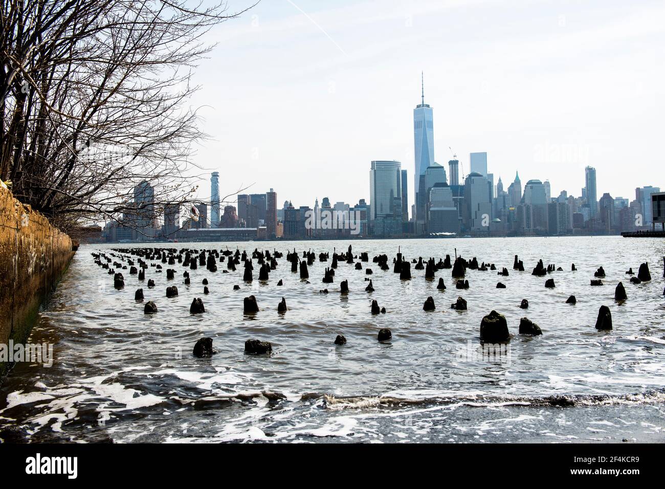 New York City, USA. Remains of a Hudson river harbor pier, looking out ...