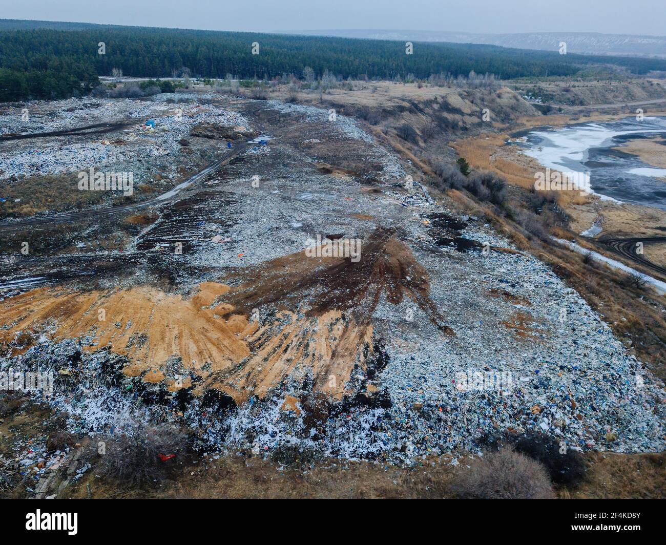 Aerial top view photo of large garbage pile at solid waste landfill ...