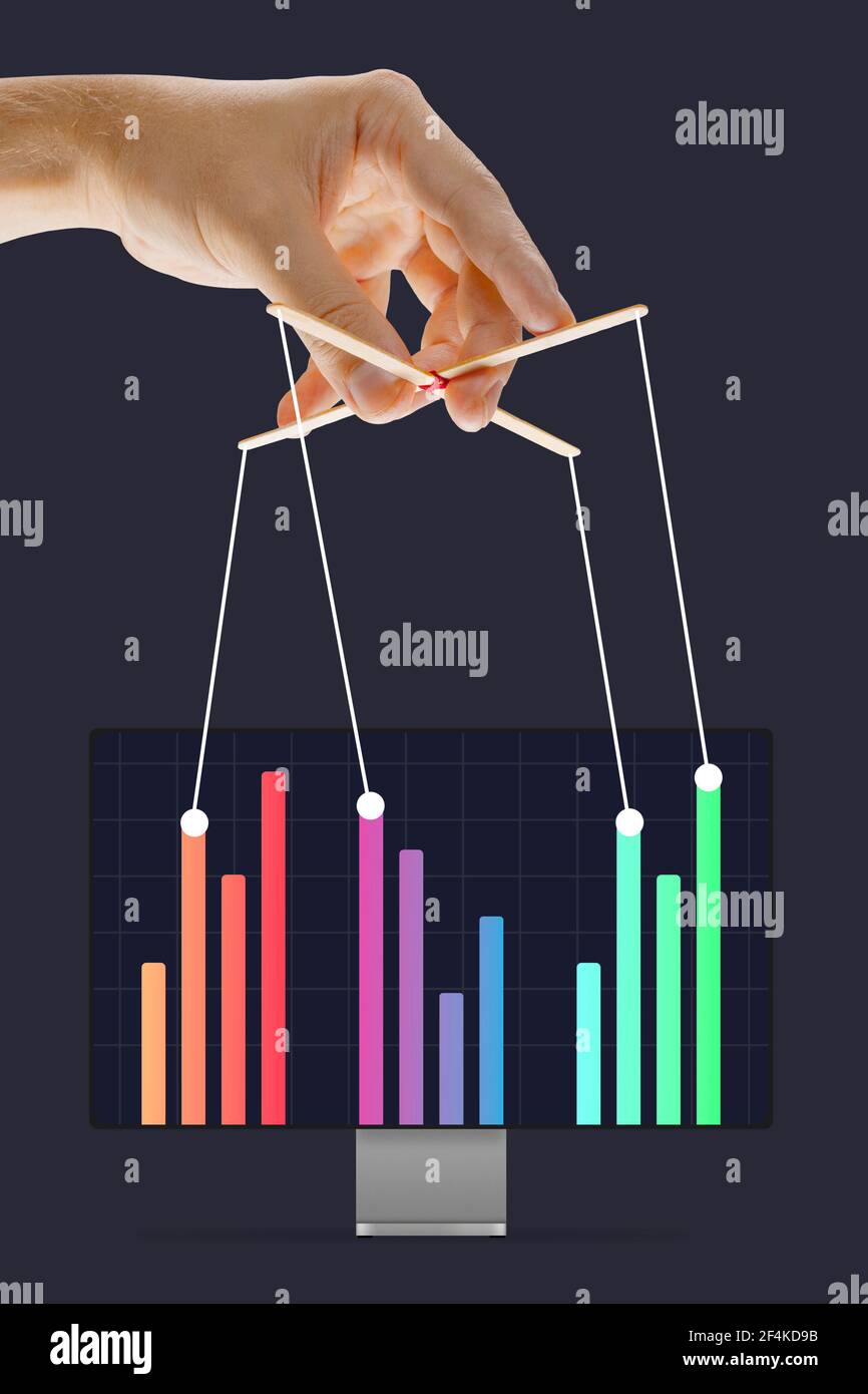 Businessman keeping the growth in economy, manipulating graphs like ...