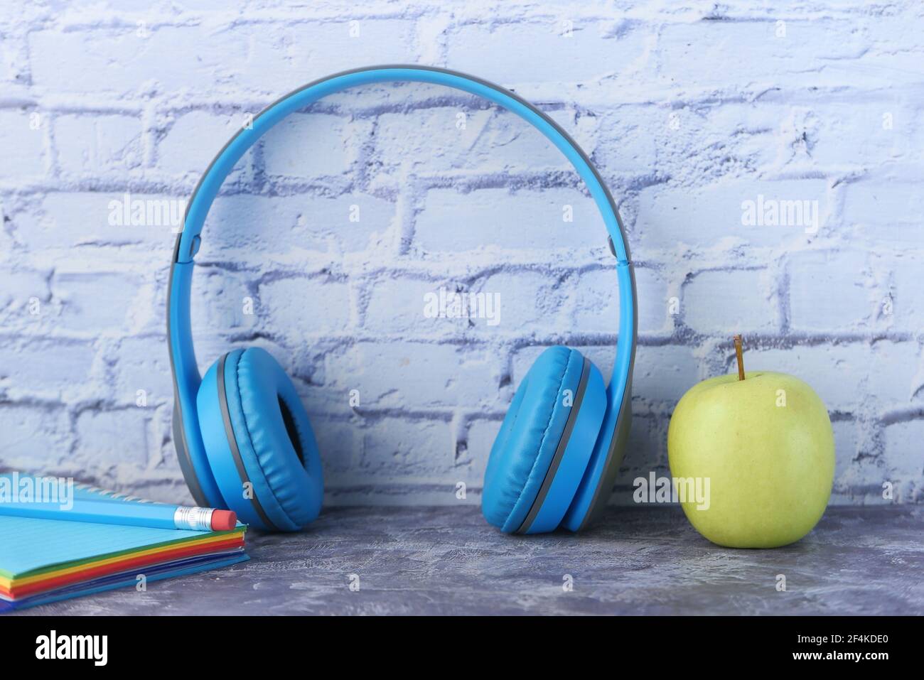 Audio book concept. Headphones and notepad on white background Stock ...