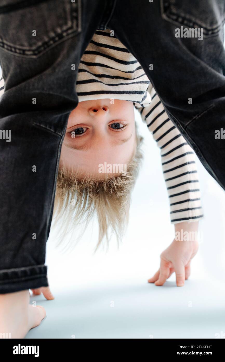 Boy bending over forward hi-res stock photography and images - Alamy