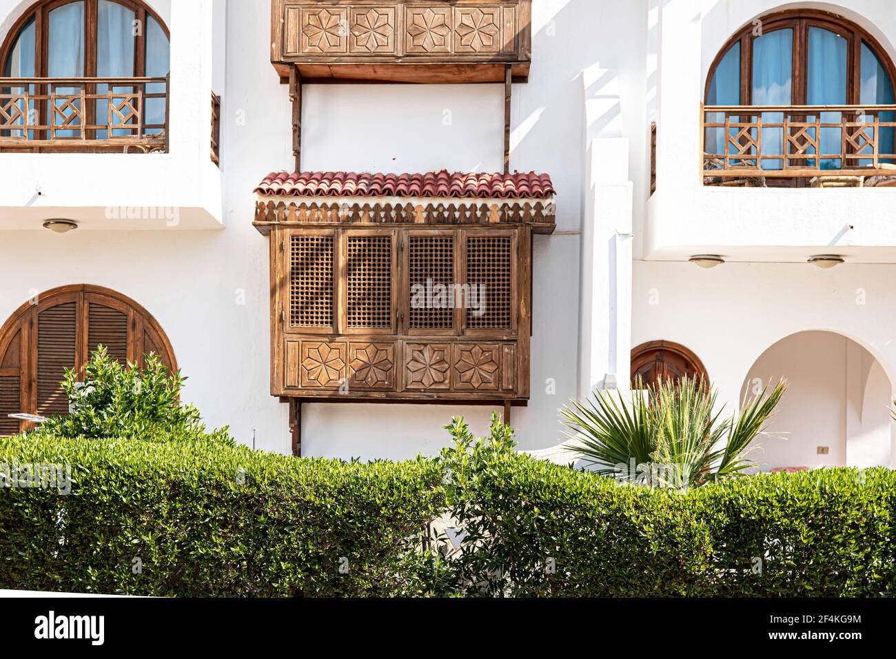 Old ancient wooden balcony with shutters of the traditional house in ...