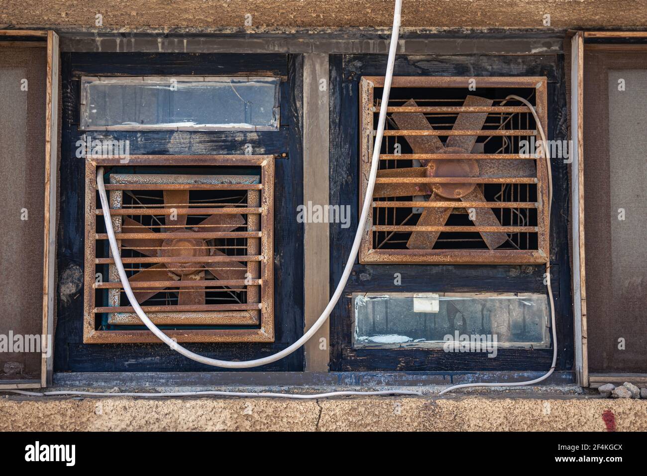 Close up of rusty dirty metal ventilation fan of old air conditioning ...
