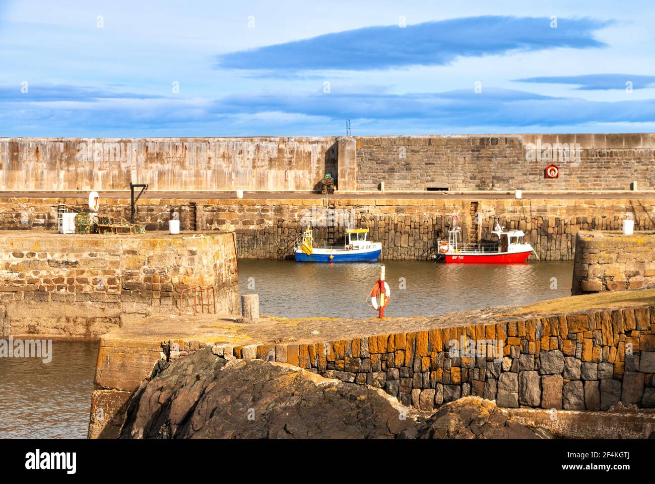 PORTSOY OLD HARBOUR MORAY FIRTH ABERDEENSHIRE SCOTLAND YELLOW LICHEN ...