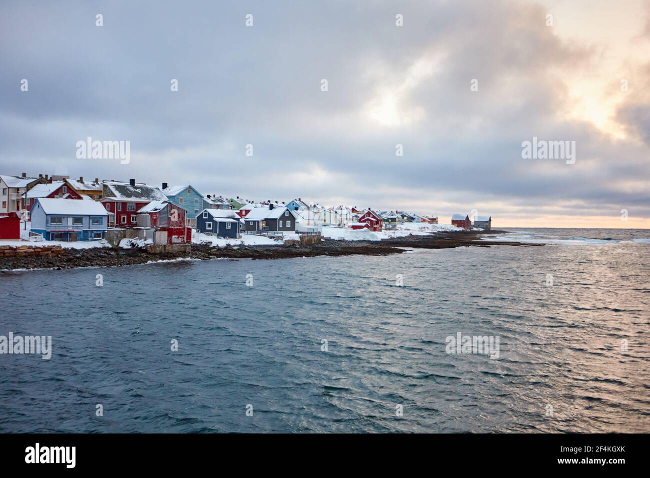 the beautiful beach in winter with snow and clouds Stock Photo - Alamy