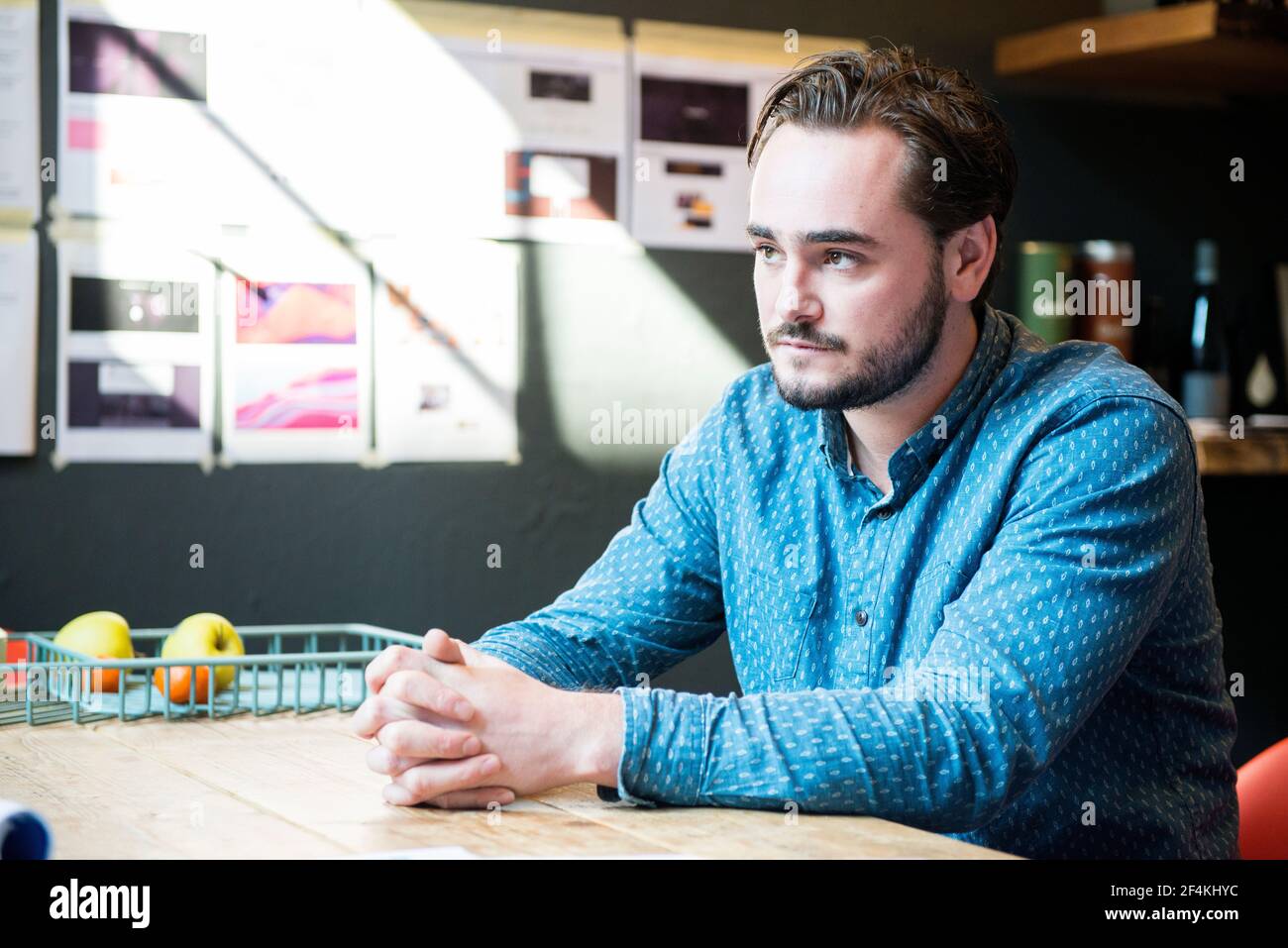 Utrecht, Netherlands. Young, professional male explaining his work ...