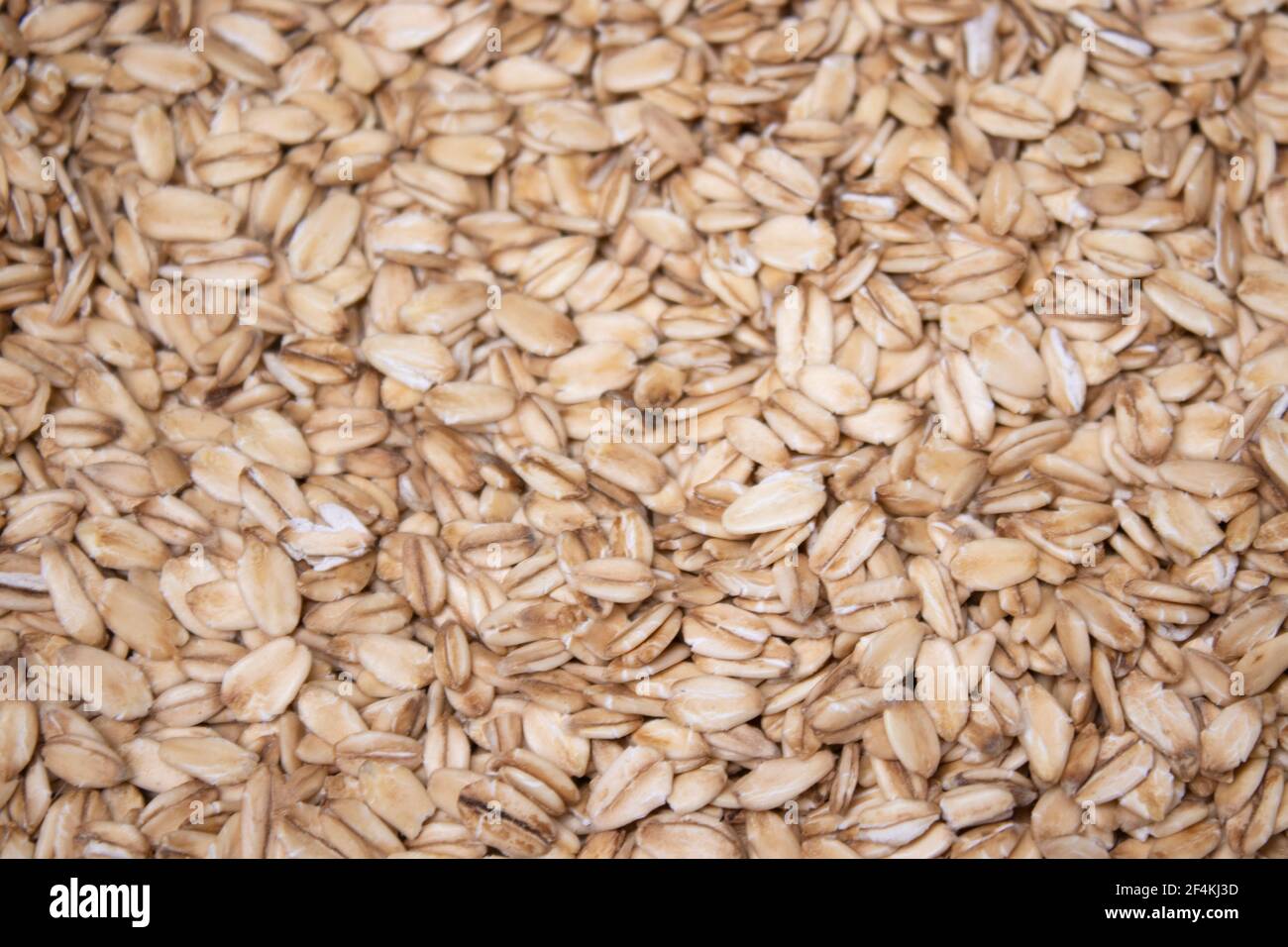 Macro Oatmeal texture. oat flakes food background. Healthy breakfast ...