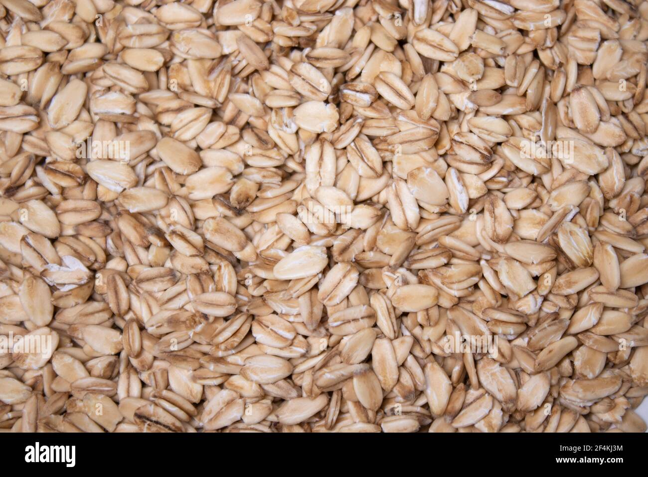 Macro Oatmeal texture. oat flakes food background. Healthy breakfast ...