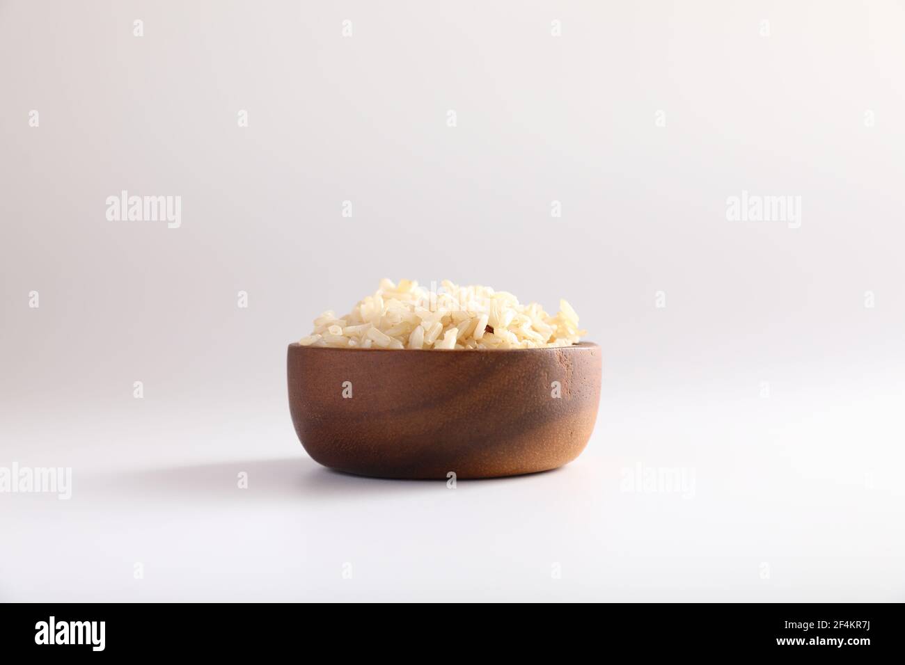 Organic boiled brown rice on bowl in close up Stock Photo - Alamy