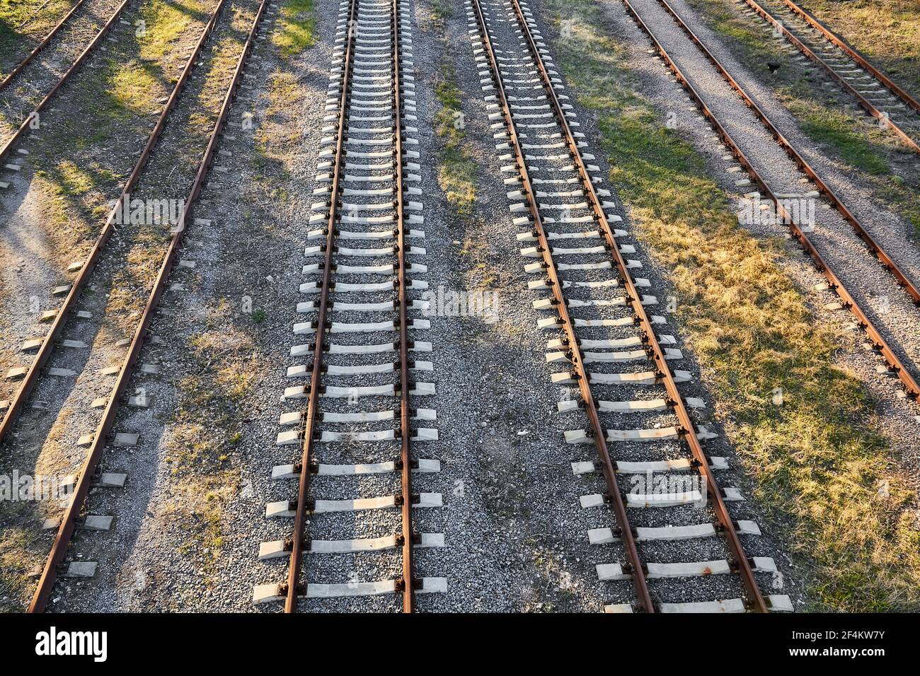 Rusty railroad tracks on gravel. Top view Stock Photo - Alamy