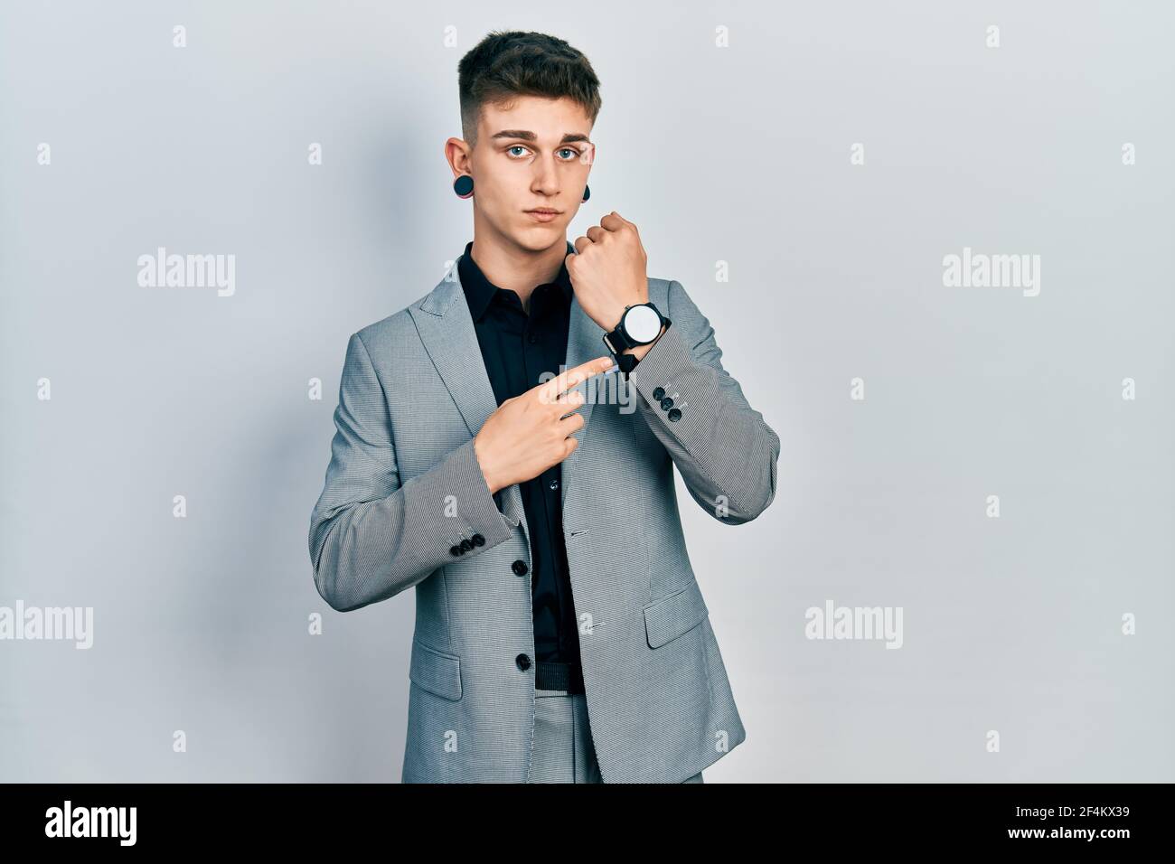 Teen pointing watch impatient hi-res stock photography and images - Alamy