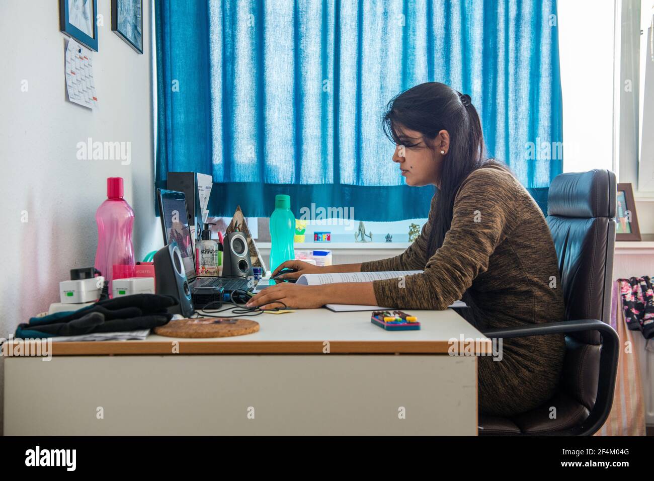 Aachen, Germany. Young, Indian university exchange student working ...