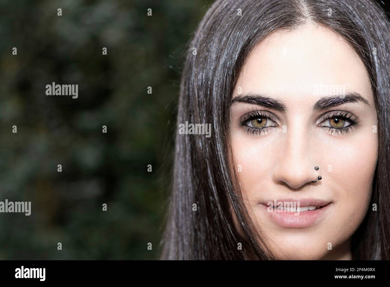 face of a young brunette girl in the first plane Stock Photo - Alamy