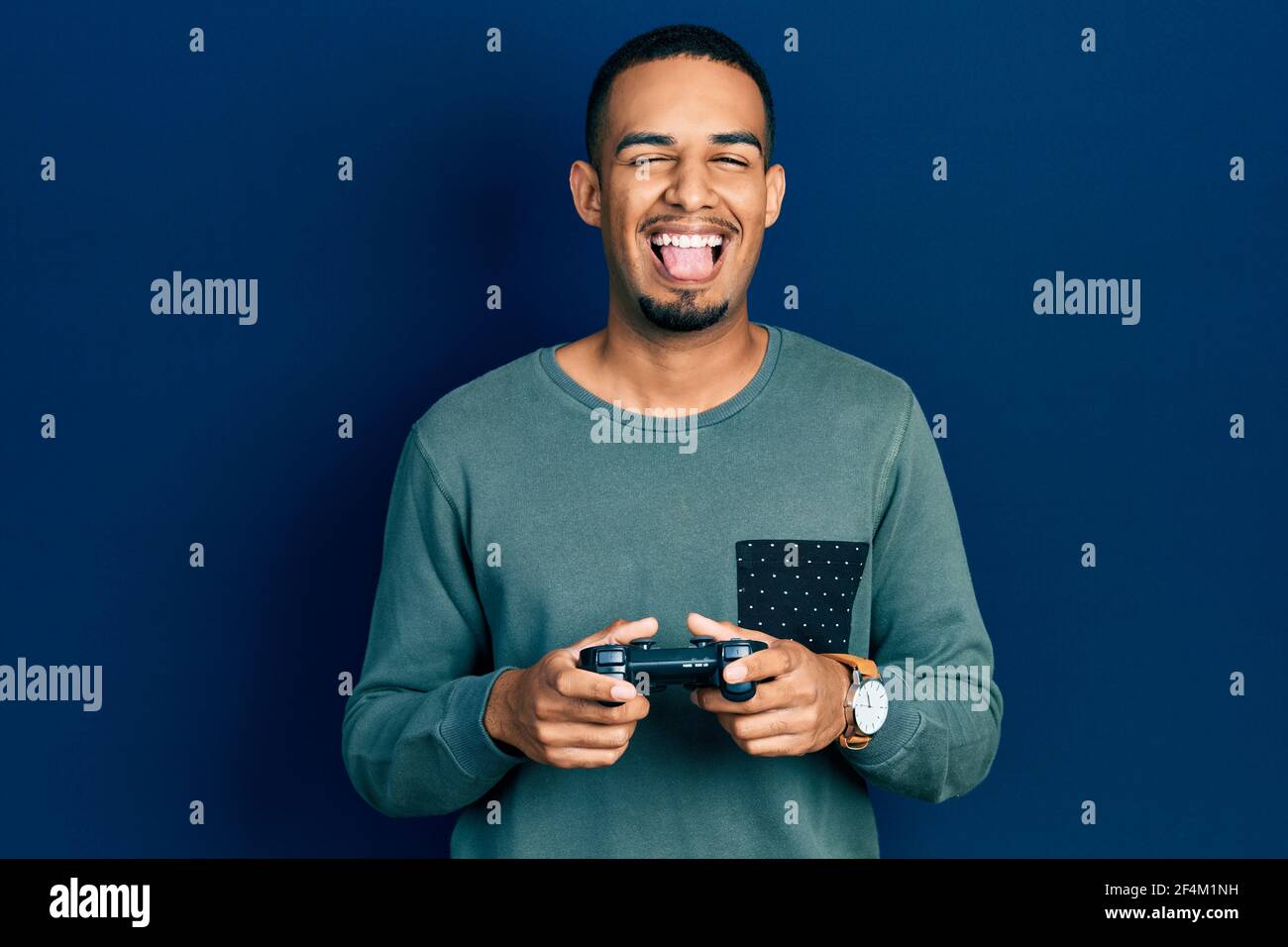 Tongue out smile video hi-res stock photography and images - Alamy