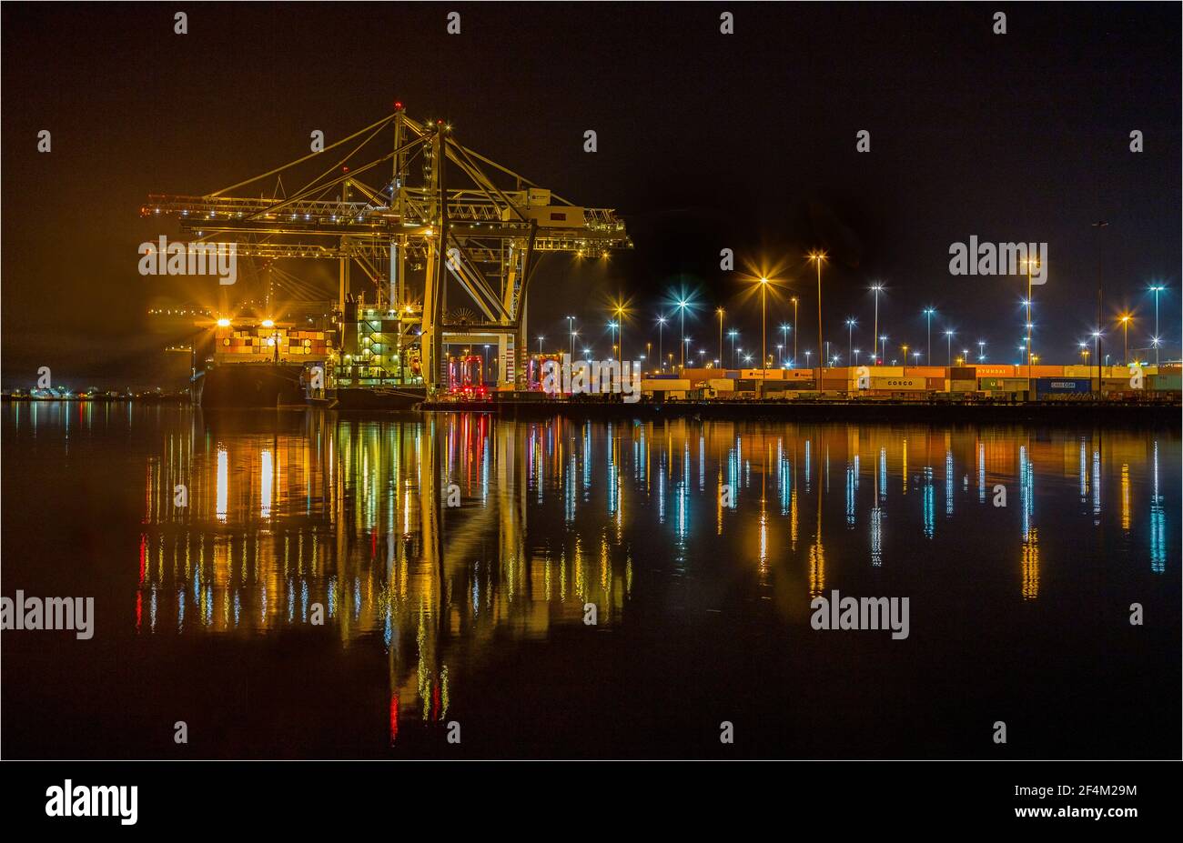 Container port at night hi-res stock photography and images - Alamy