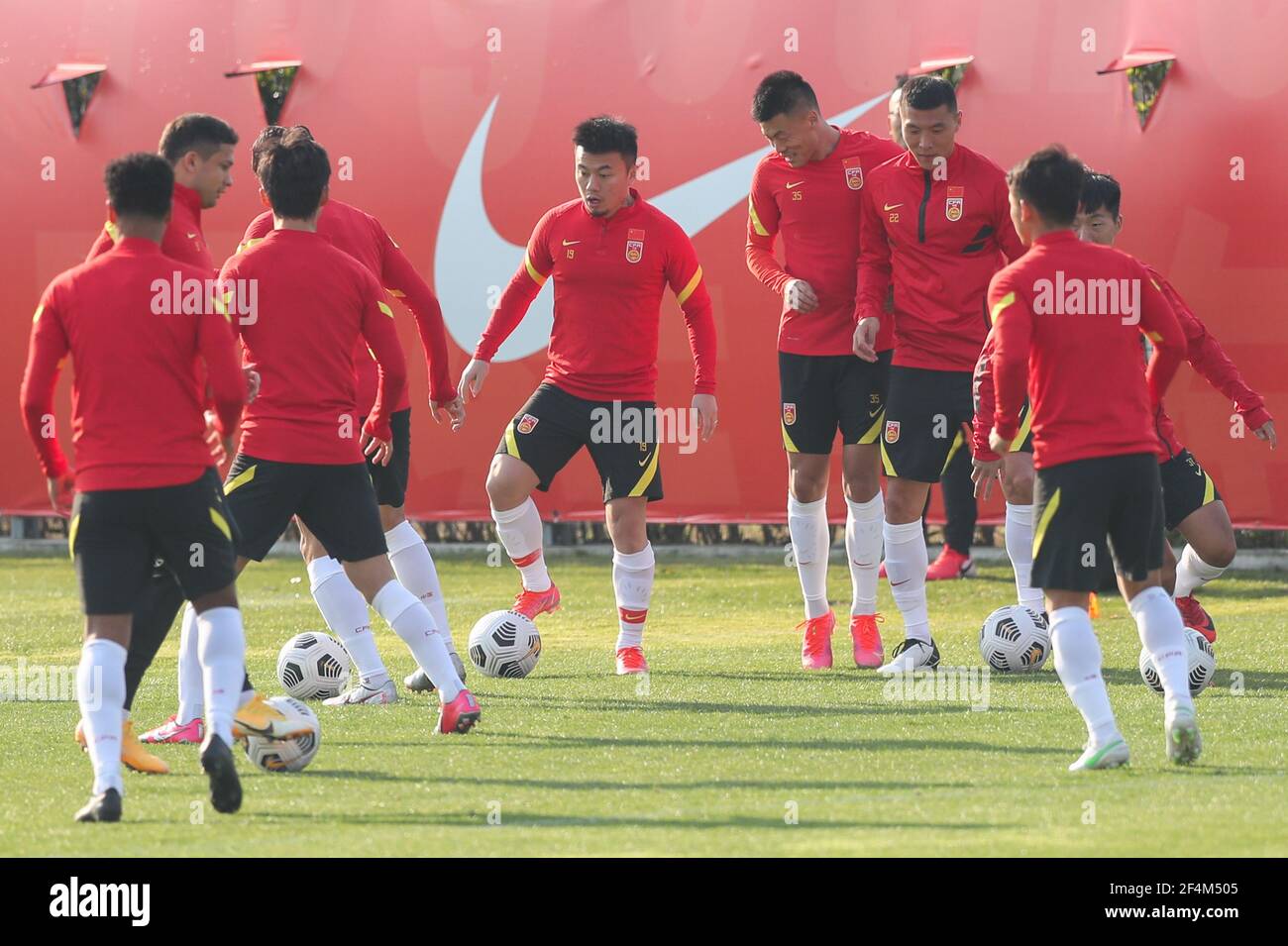 Shanghai. 22nd Mar, 2021. Players of Chinese men's national football ...