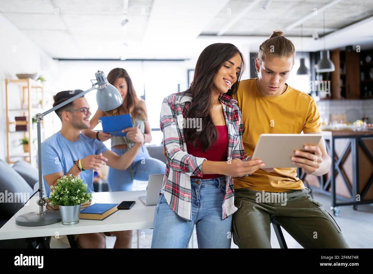 Group of friends, students discussing brainstorming at meeting ...