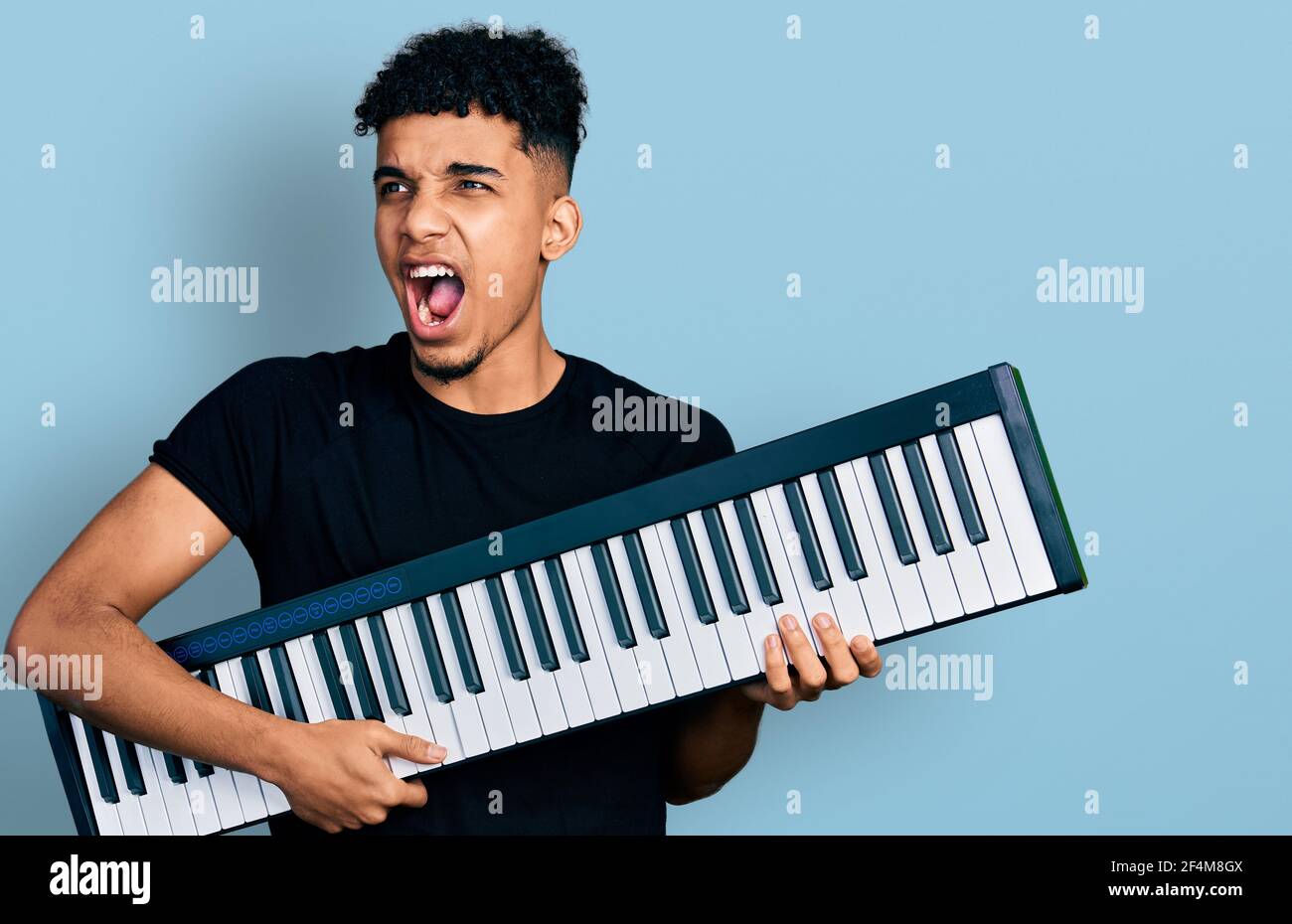Playing mouth keyboard hi-res stock photography and images - Alamy