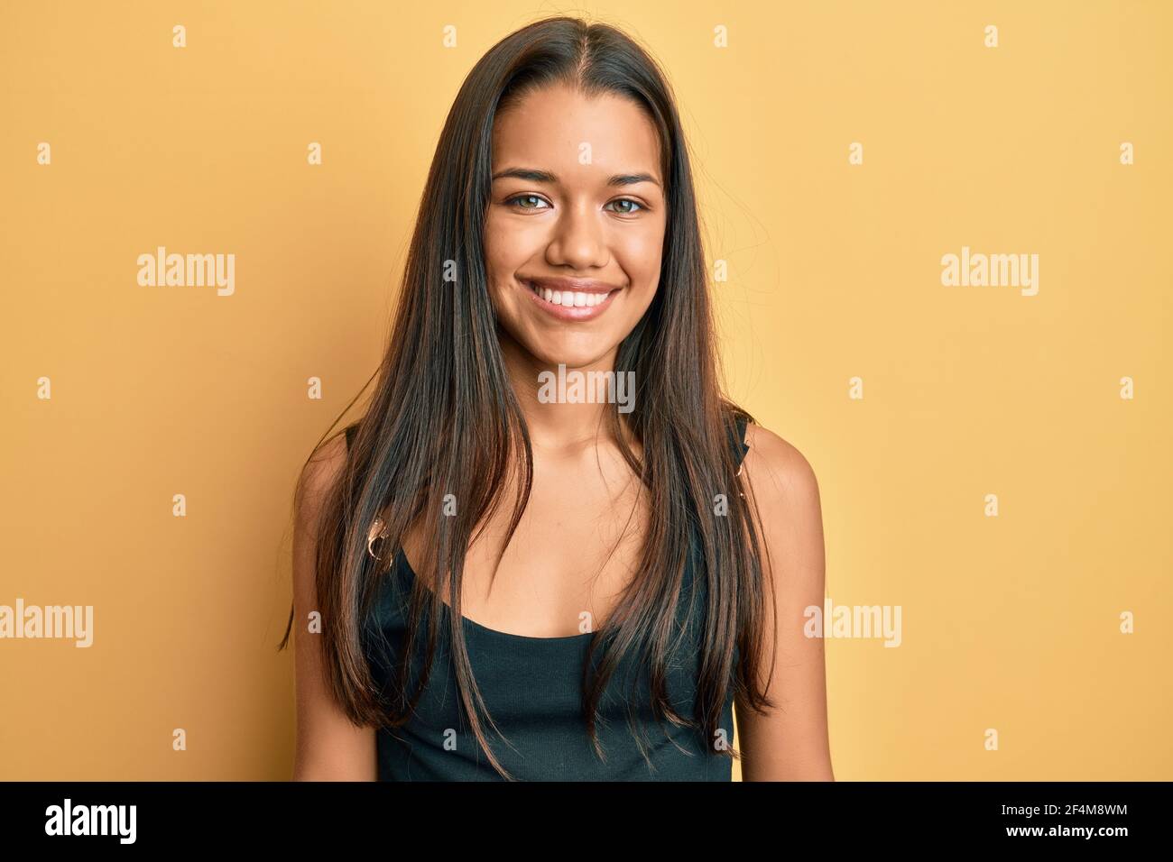 Beautiful hispanic woman wearing casual clothes with a happy and cool ...