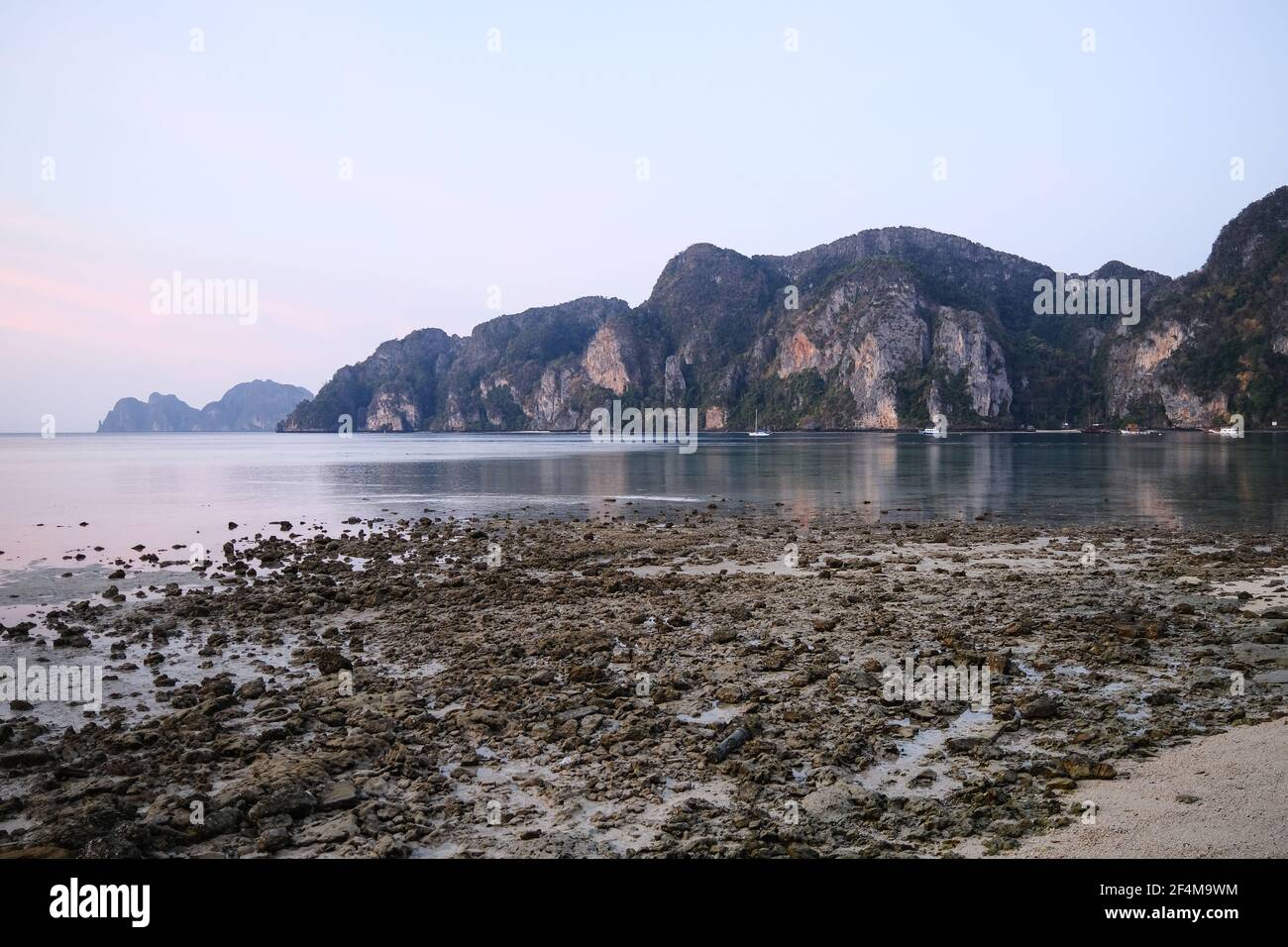 Sunrise in Phi Phi Island Tonsai Bay Stock Photo - Alamy