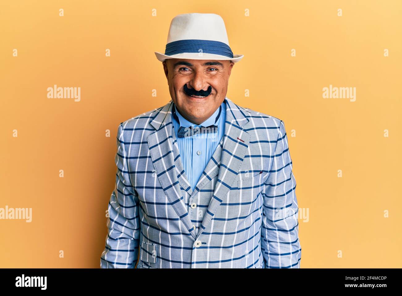 Mature middle east man with mustache wearing vintage and elegant ...