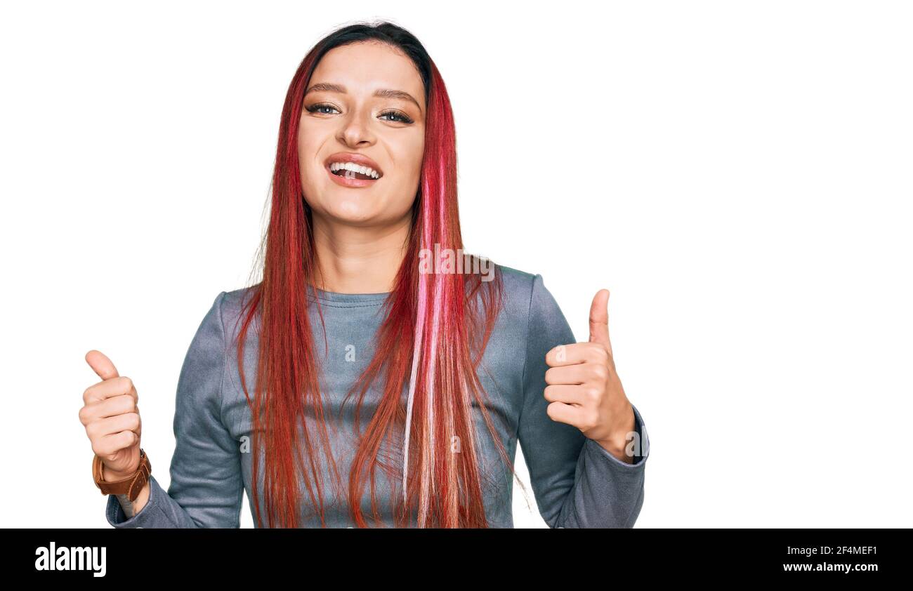Young caucasian woman wearing casual clothes success sign doing ...