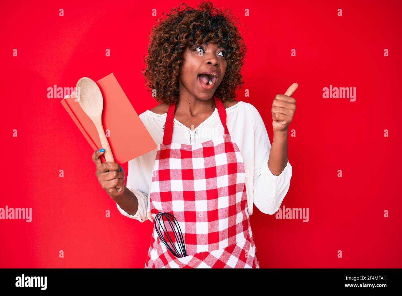 Professional afro american female baker hi-res stock photography and ...