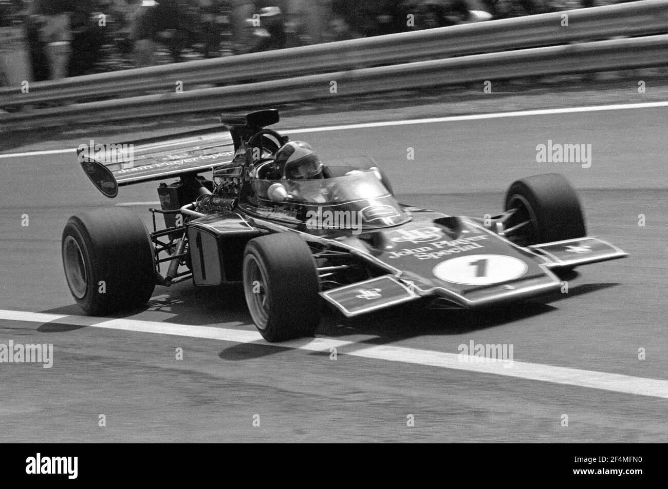 Emerson FITTIPALDI driving Lotus-Ford F1 car in full speed during 1972 ...