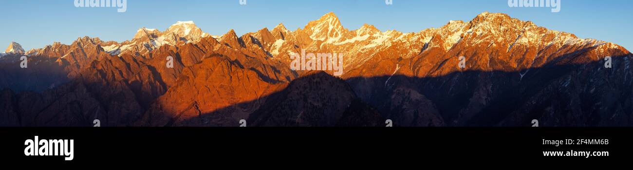 Himalaya, evening panoramic view of Indian Himalayas from Joshimath Auli, great Himalayan range ...