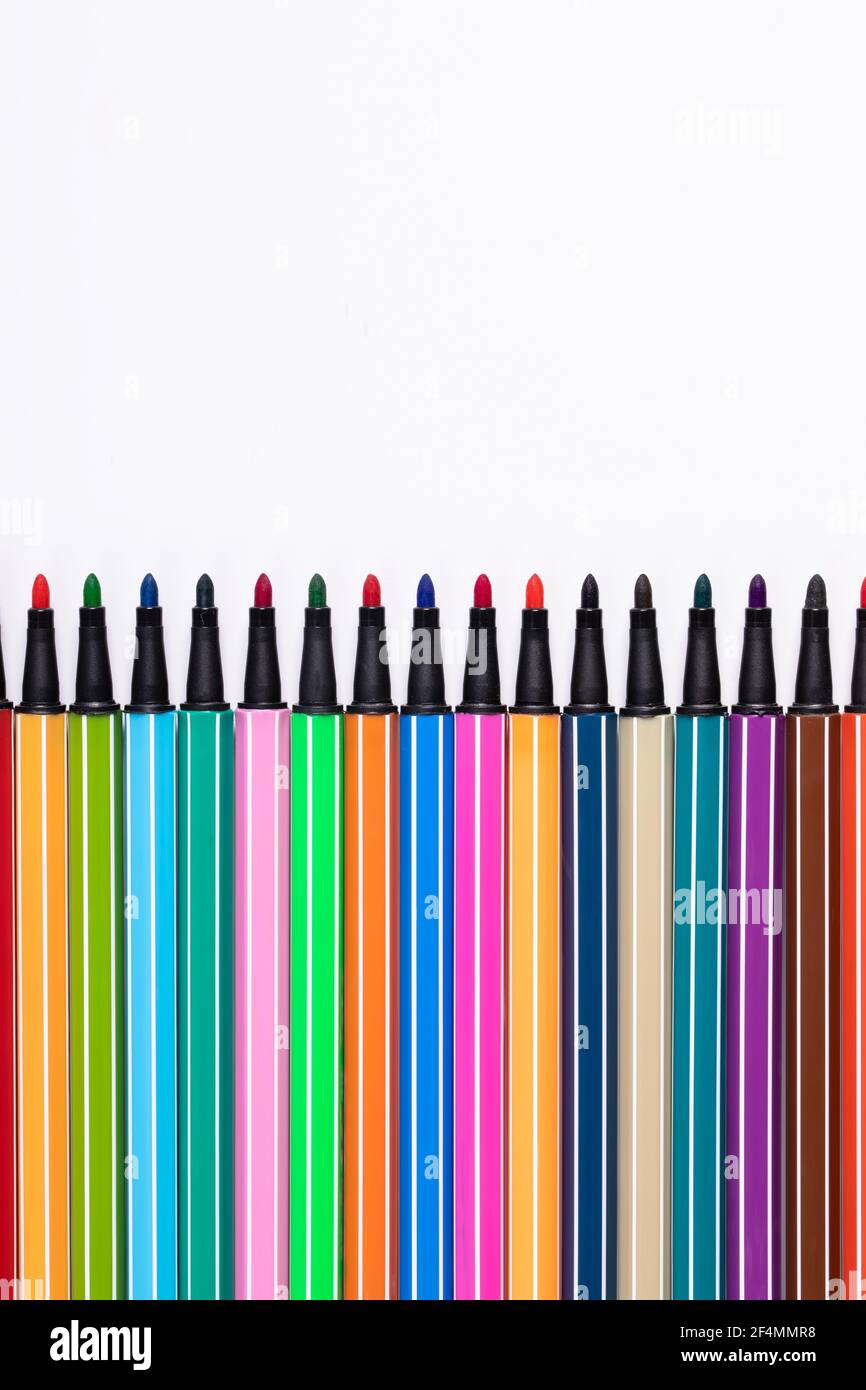 Colored markers without caps isolated on pink background Stock Photo ...
